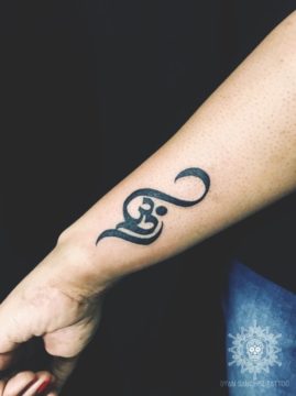 39 Spiritual OM Tattoo Designs to know the 'Meaning Of Universe